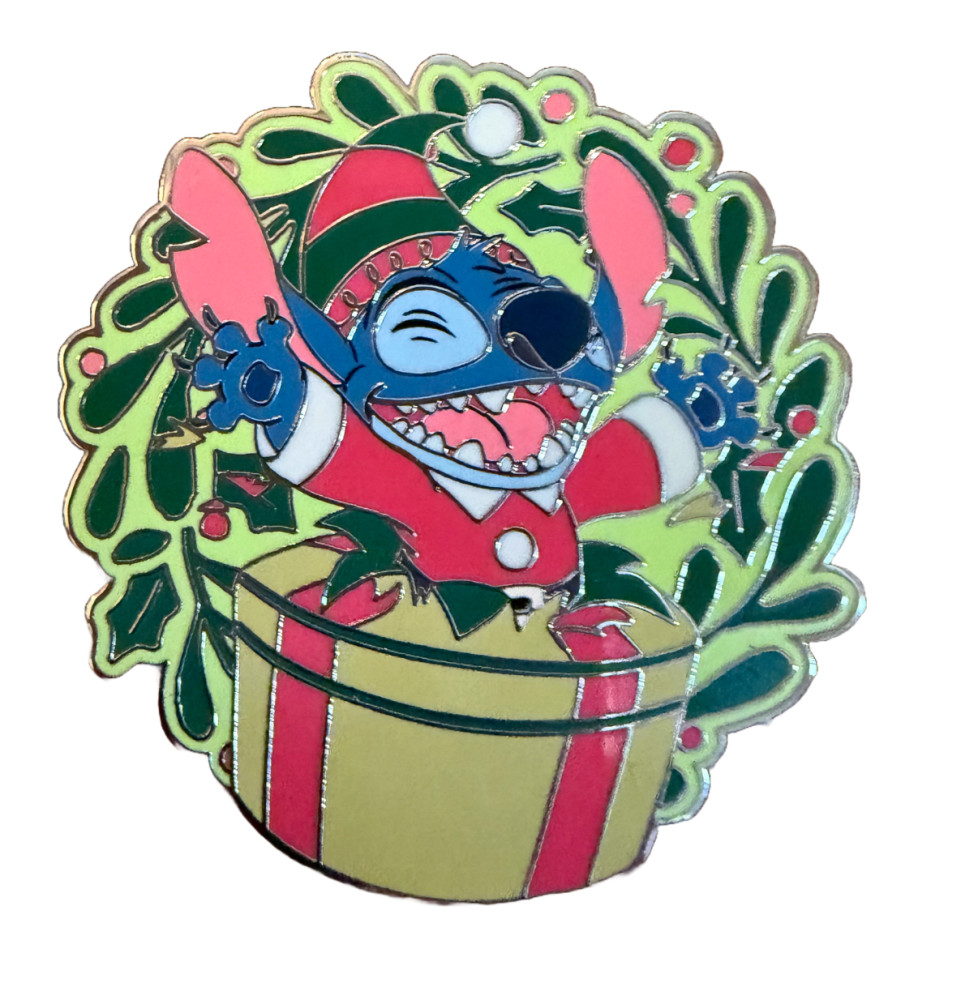 Making Christmas Magical - Festive Stitch popping out of present box ...